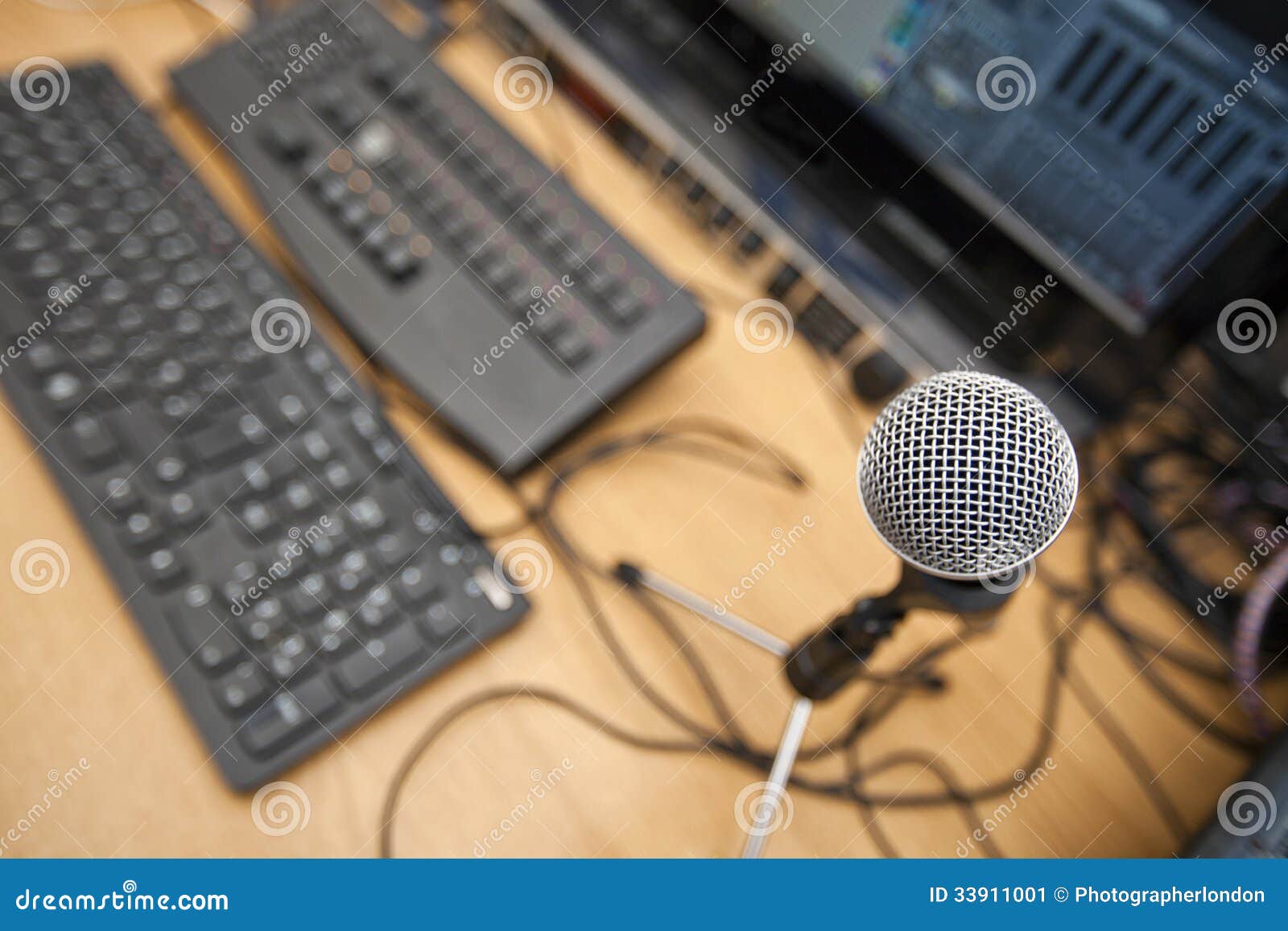 Microphone and Computer Keyboards on Table at Television Studio Stock ...
