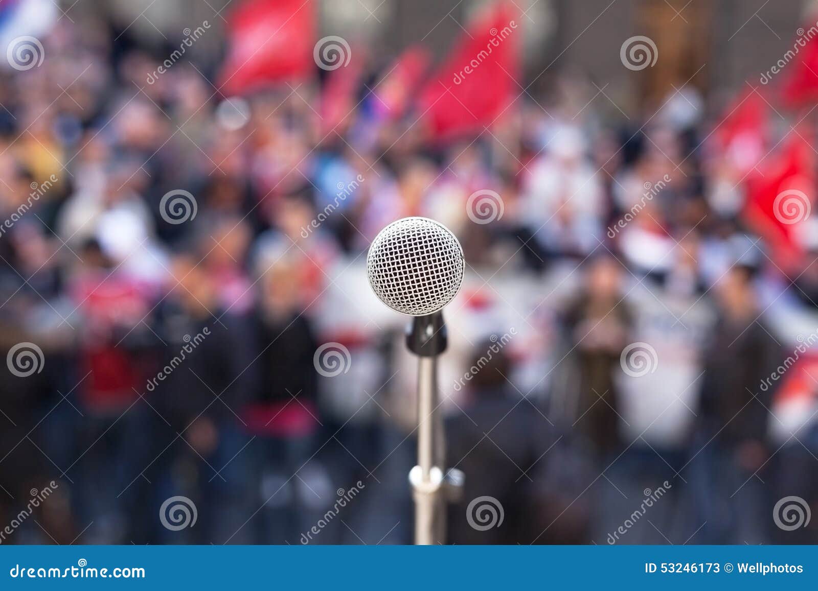 Microphone in Focus Against Unrecognizable Crowd of People Stock Image ...