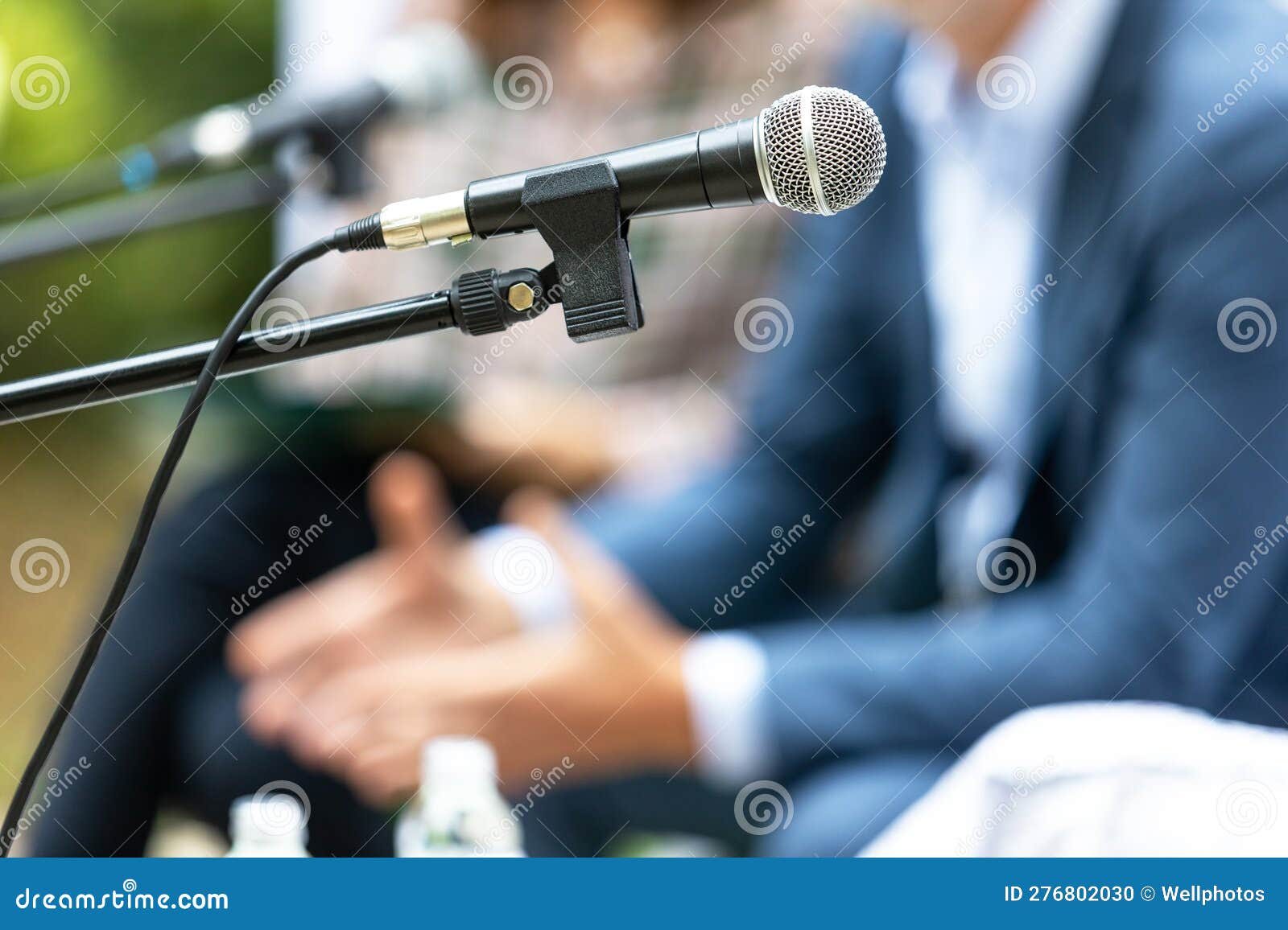 Microphone in Focus at Roundtable Meeting or Business Event Stock Photo ...