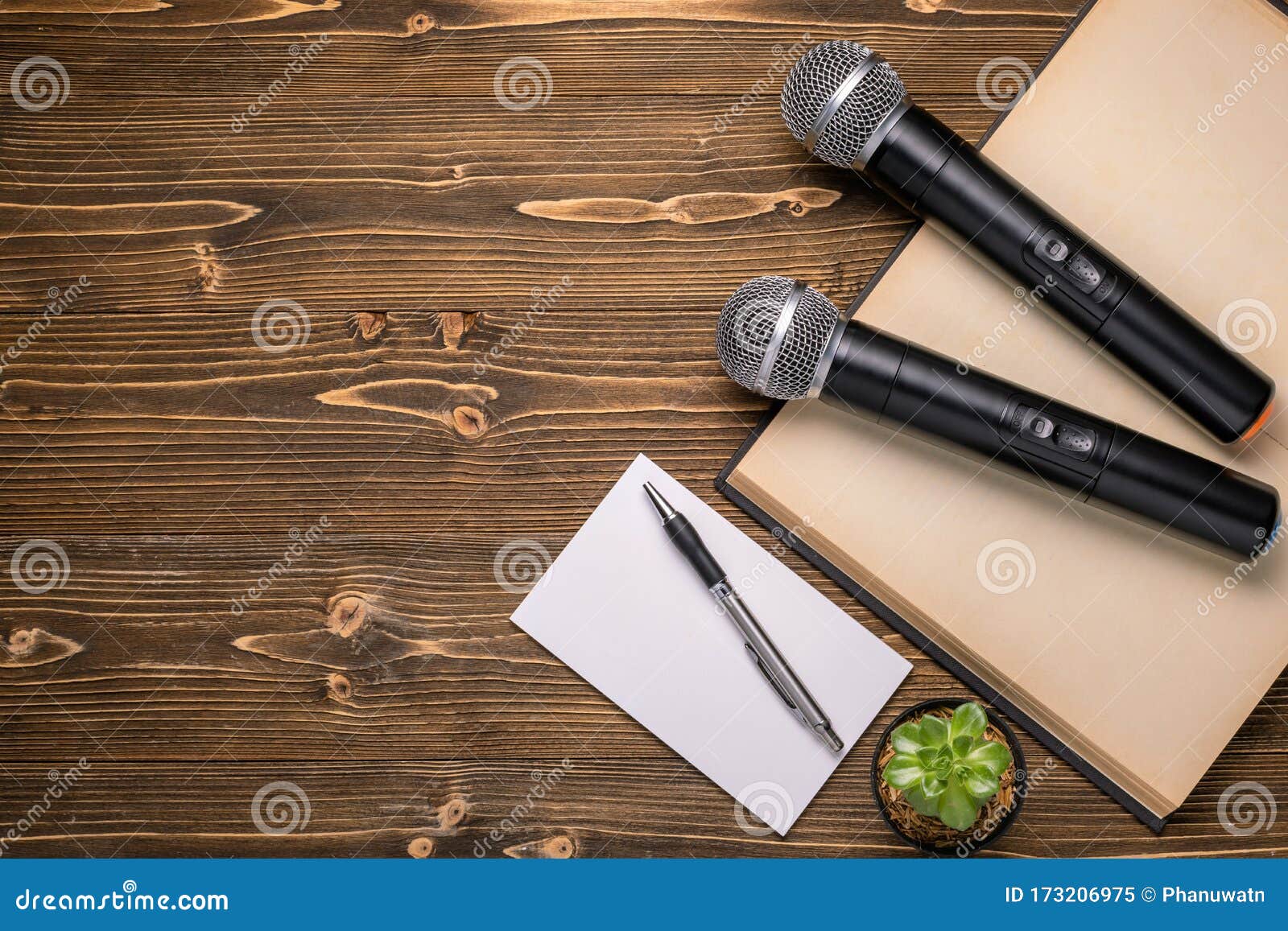 Microphone, Headphone, Book and Paper Note on Brown Wooden Board ...