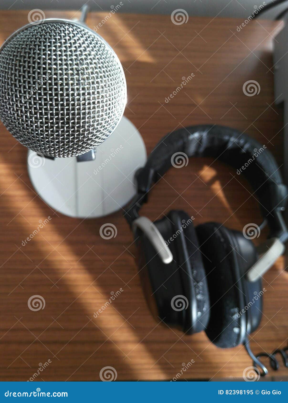 Microphone and Headphones on a Radio Studio Wood Table Stock Image ...