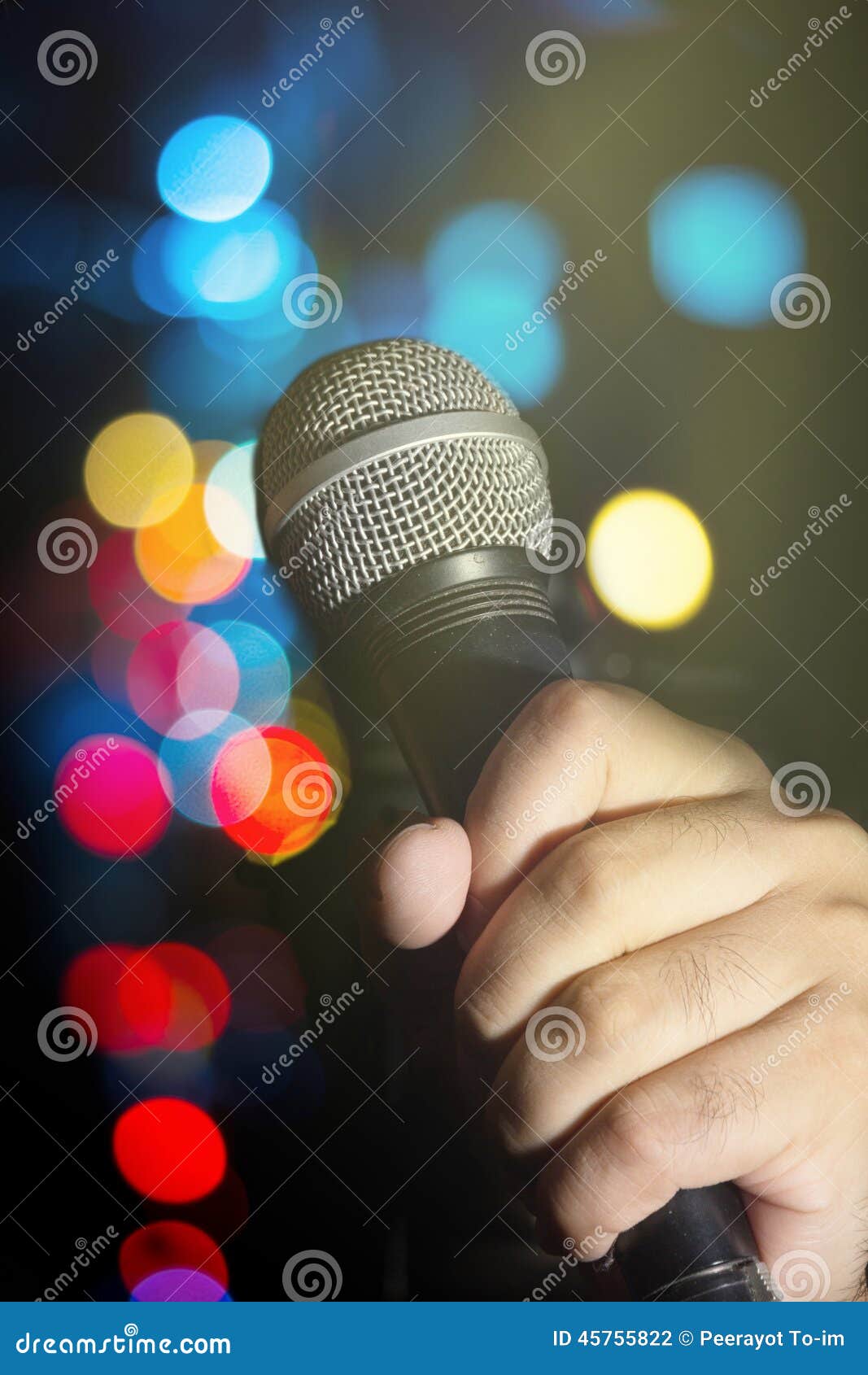 Microphone in human hand. stock photo. Image of audience - 45755822