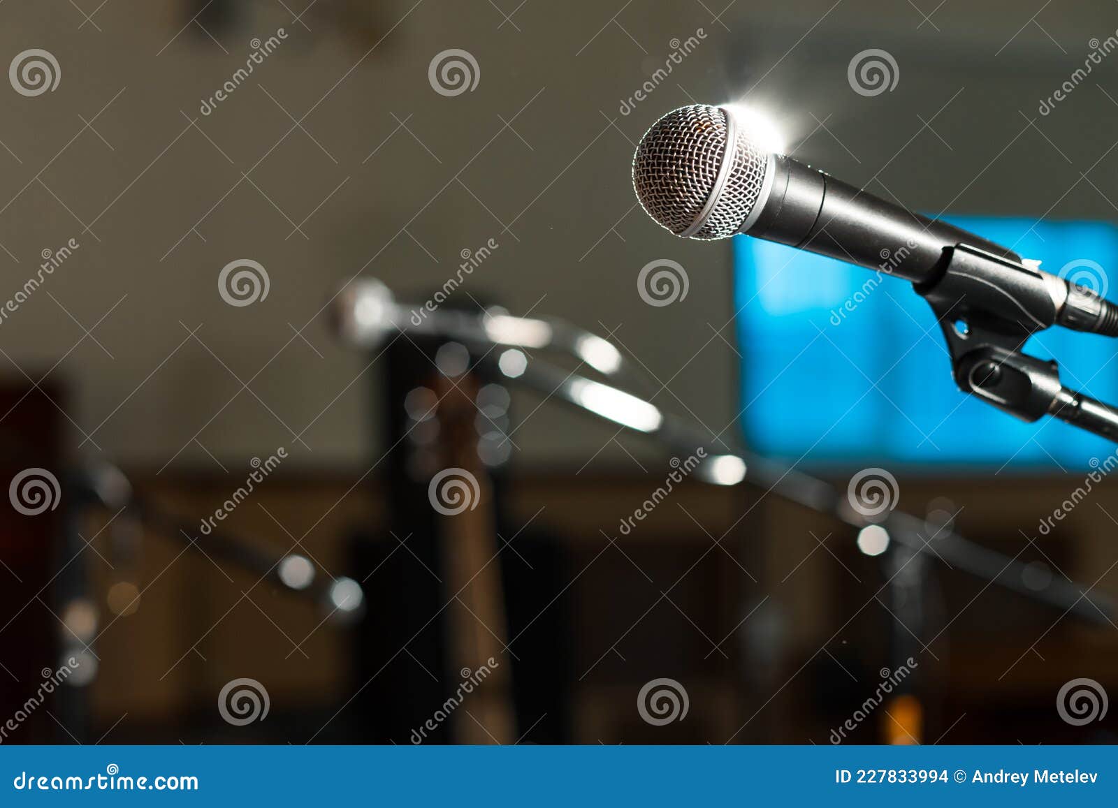 Microphone Illuminated from Behind by a Lantern Illuminating the Stage ...