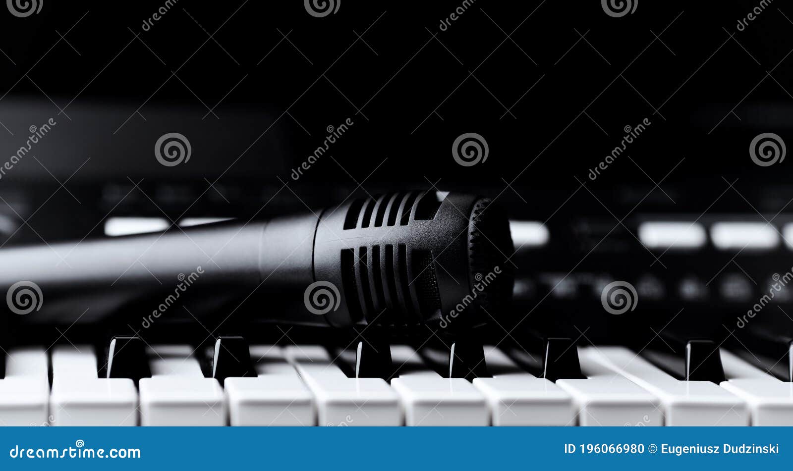 Microphone on keyboard . stock photo. Image of microphone - 196066980