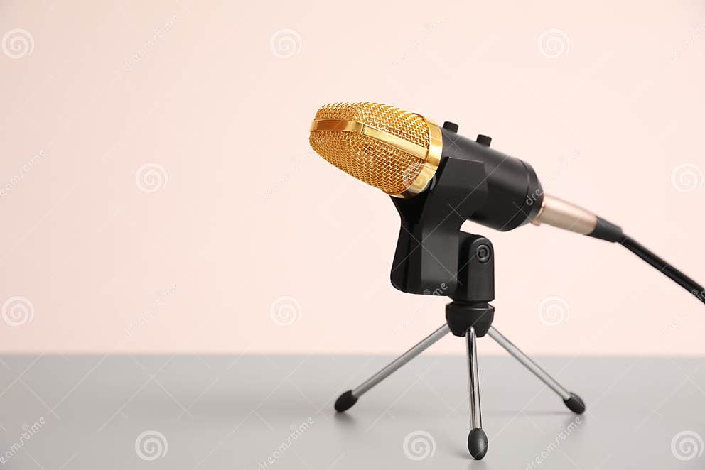 Microphone on Light Grey Table, Space for Text. Journalist`s Work Stock ...