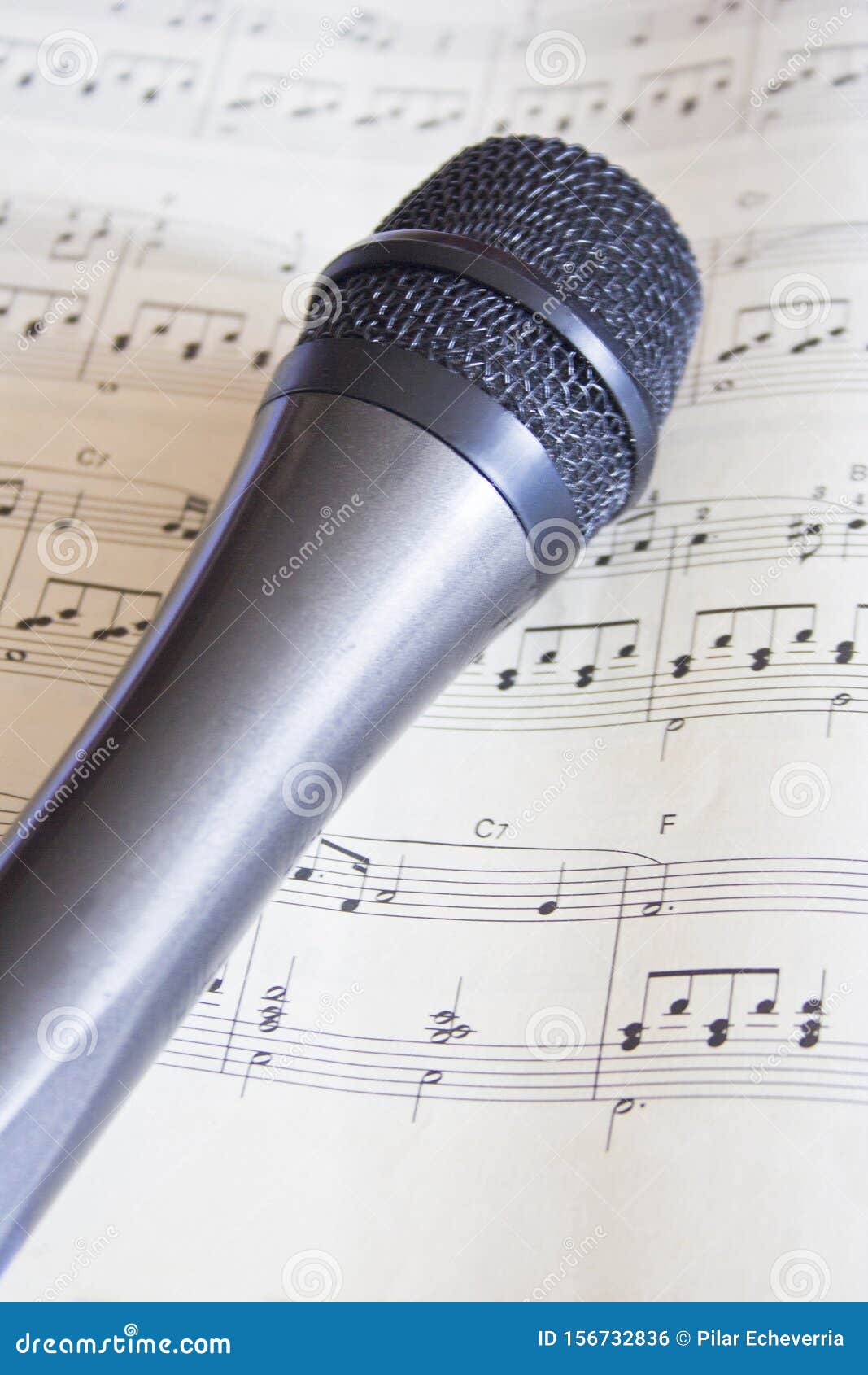 Grey Microphone and Music Sheet Stock Photo - Image of radio ...