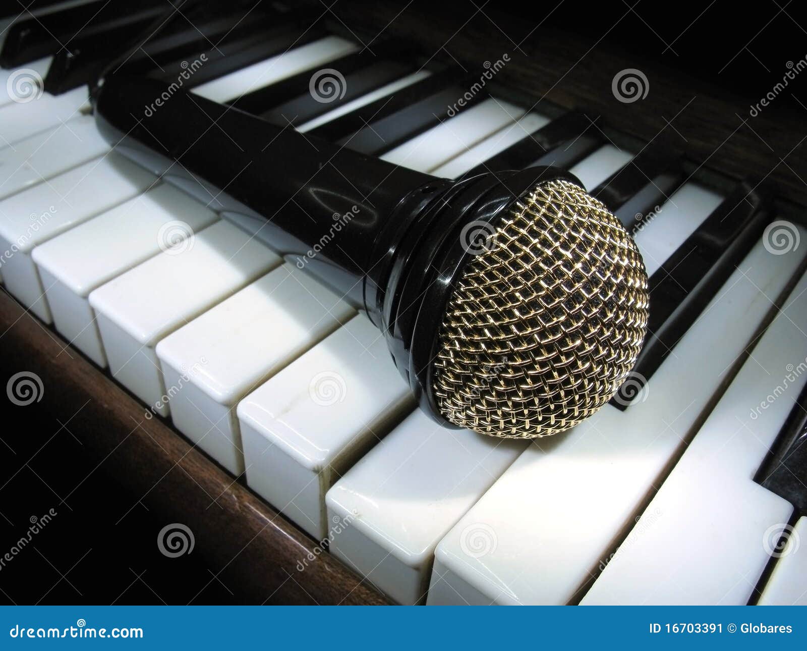Microphone on piano keys stock image. Image of electric - 16703391