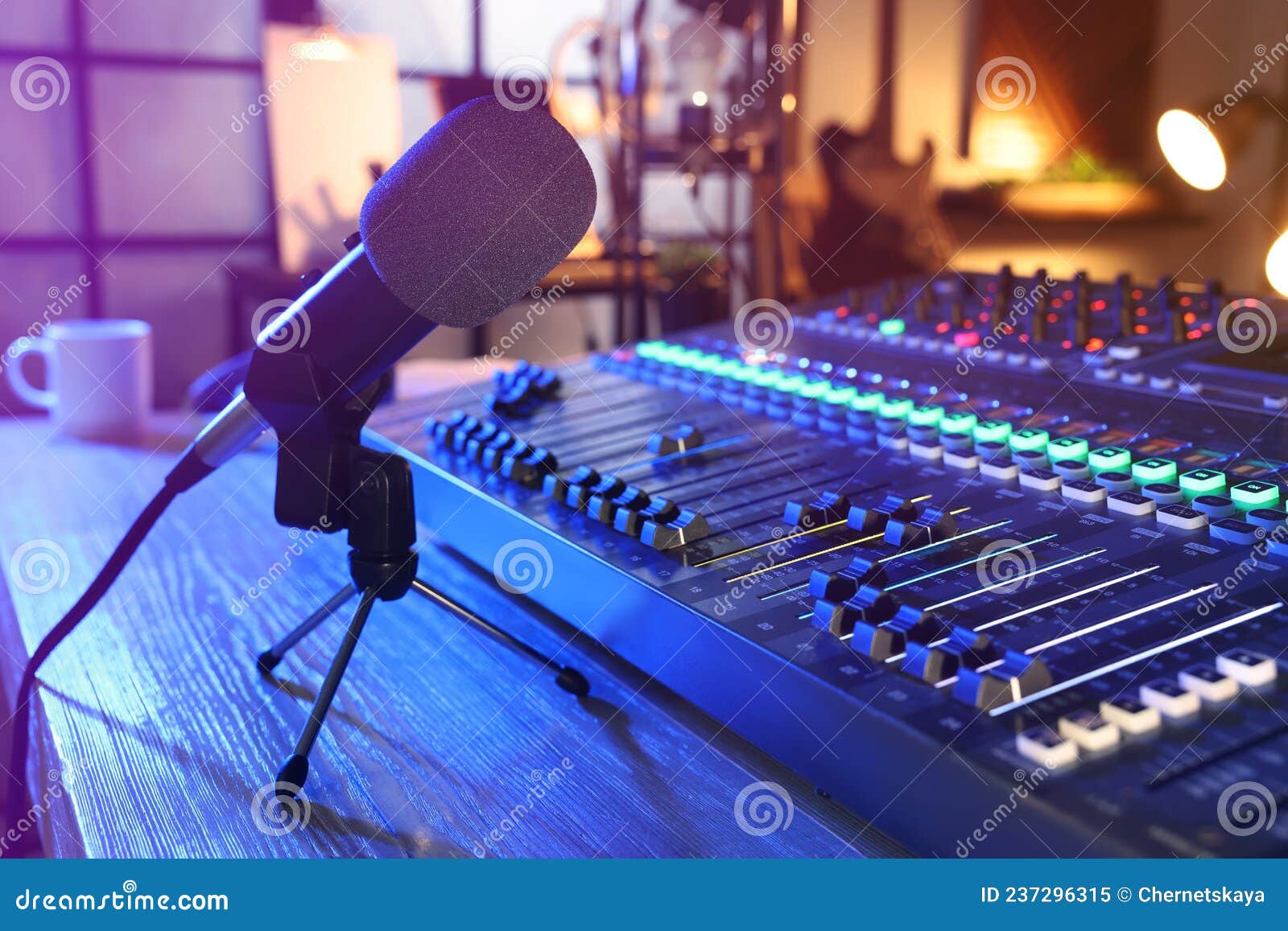 Microphone and Professional Mixing Console on Table in Radio Studio ...