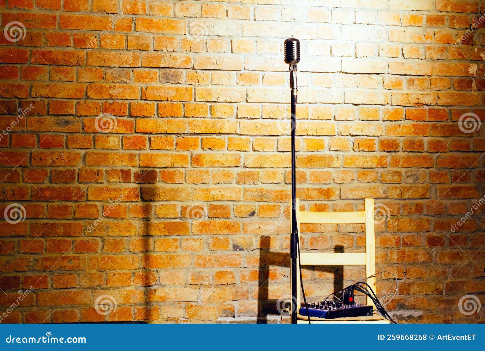 Microphone Ready on Stage Against a Brick Wall Ready for the Karaoke ...