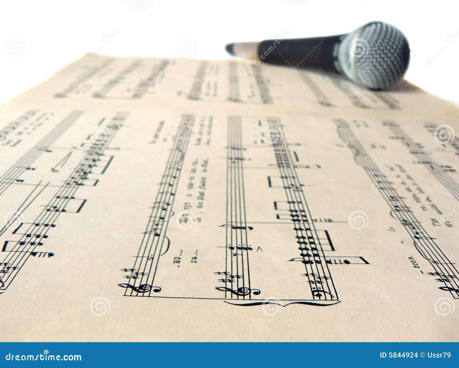 Microphone on sheet music stock photo. Image of equipment - 5844924