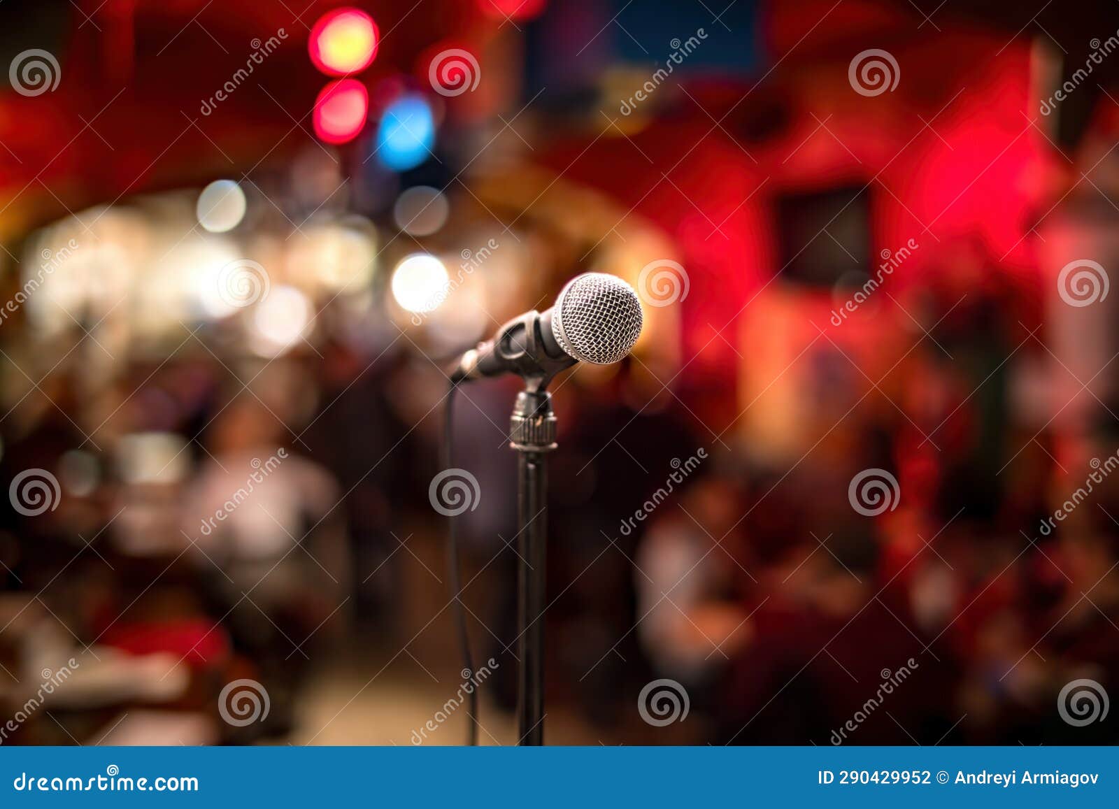 Microphone on Stage Against a Background of Auditorium Stock Photo ...