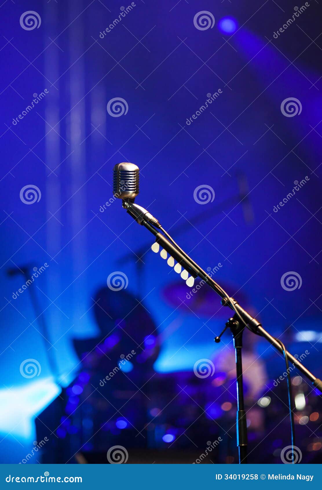 Microphone in stage lights stock photo. Image of club - 34019258