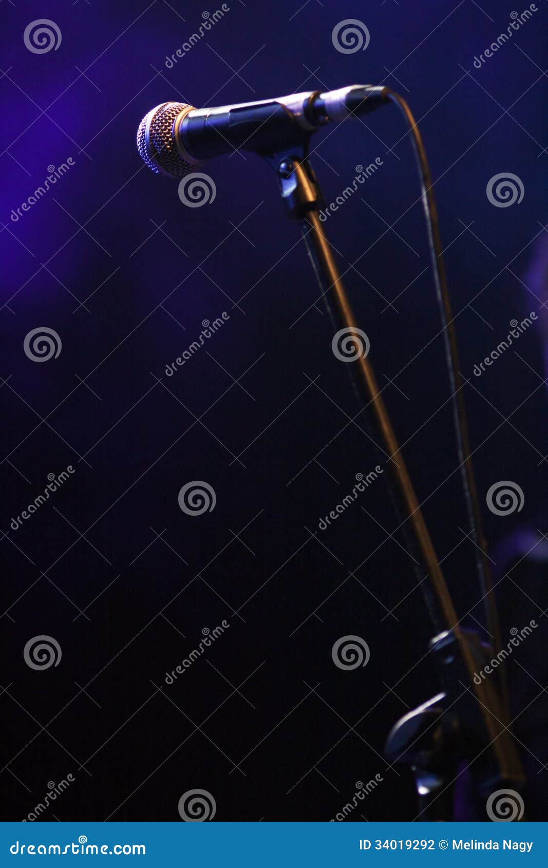 Microphone in stage lights stock photo. Image of equipment - 34019292