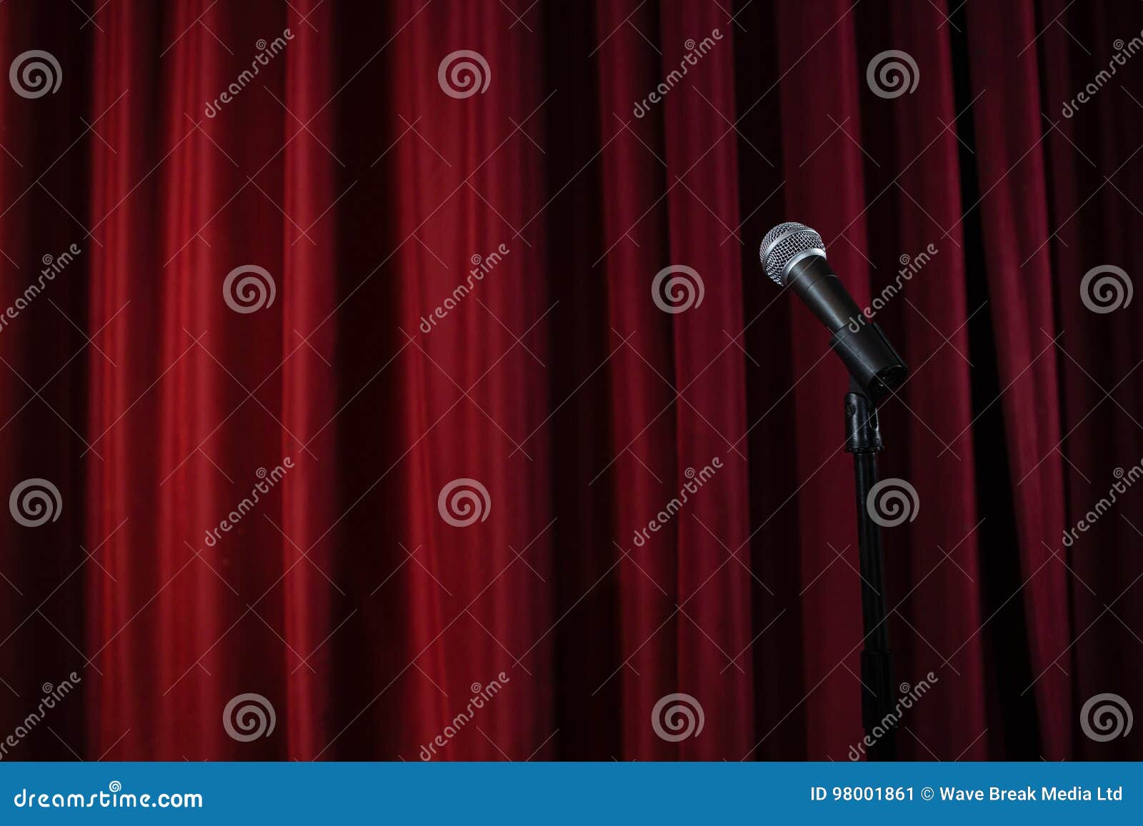 Microphone on stage stock image. Image of performance - 98001861