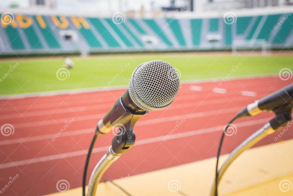 Microphone on Table Side Sport Field in Stadium. Stock Image - Image of ...