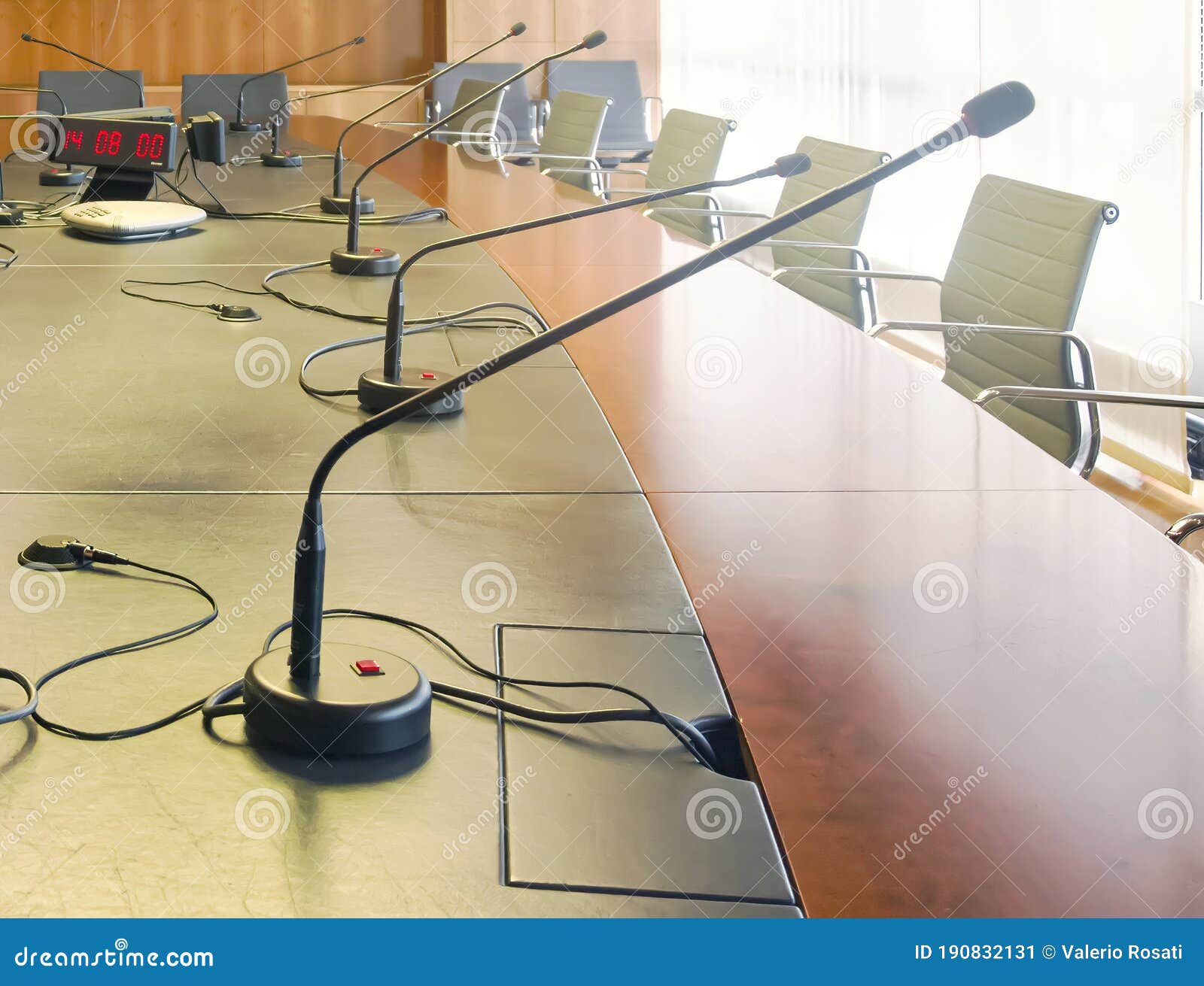 Microphone on a Wooden Table and Empty Chairs in a Boardroom Stock ...