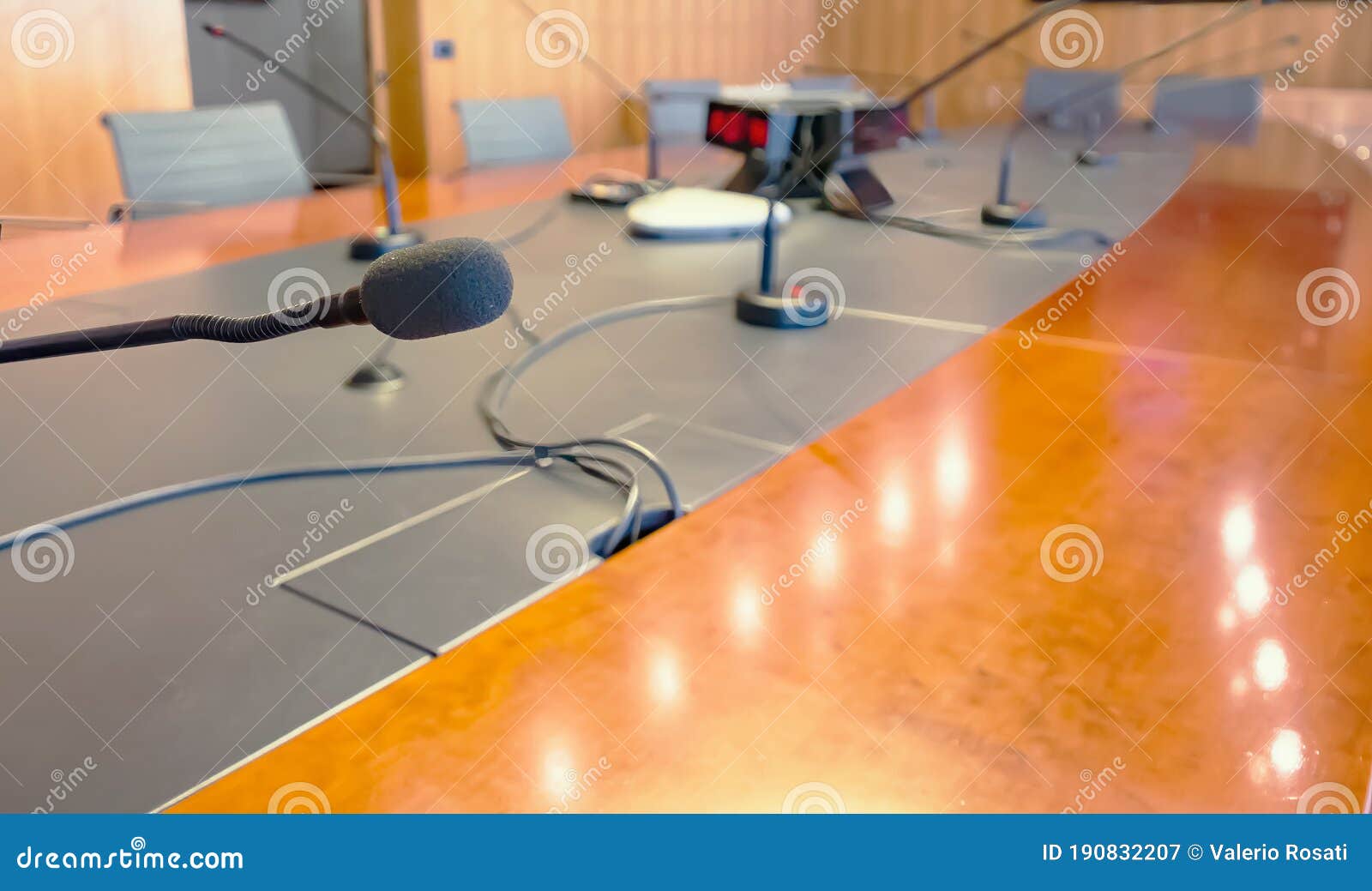 Microphone On A Wooden Table And Empty Chairs In A Boardroom Stock ...