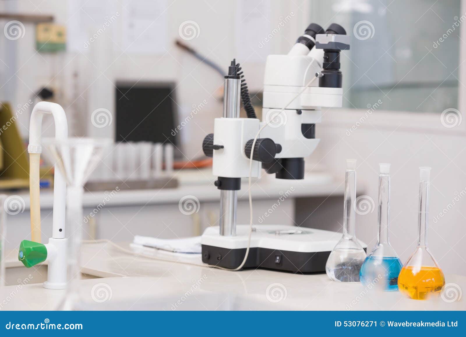 Microscope and beakers stock image. Image of technology - 53076271
