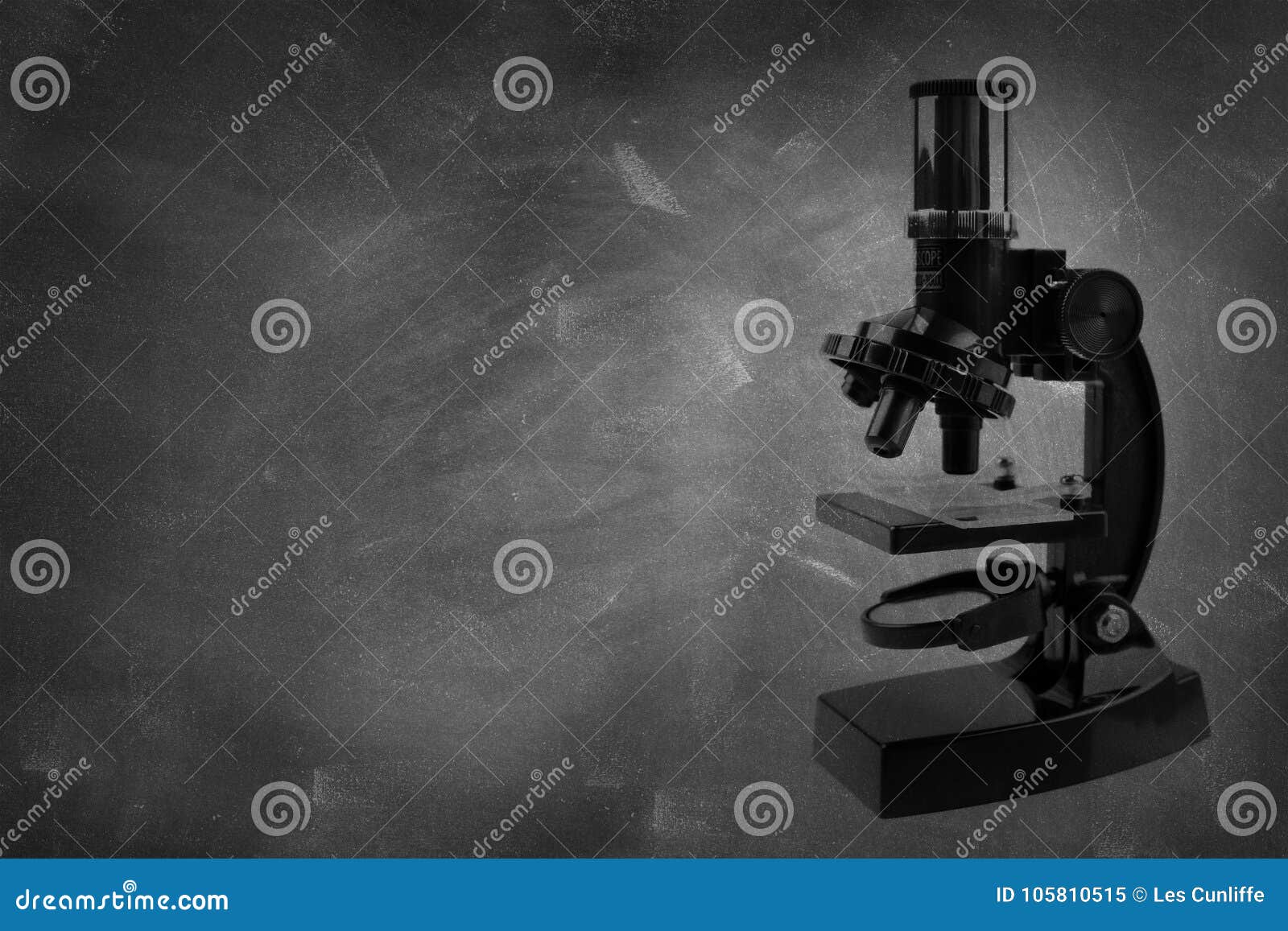 Microscope and blackboard stock image. Image of class - 105810515