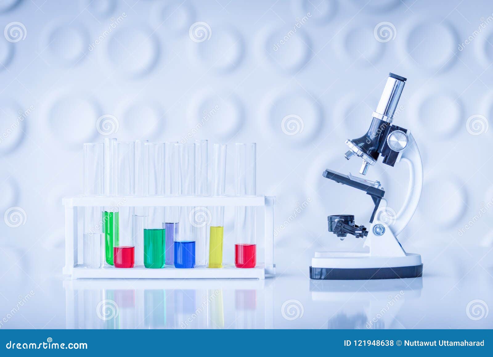 Microscope and Colorful Test Tubes on Table in Laboratory. Scien Stock ...