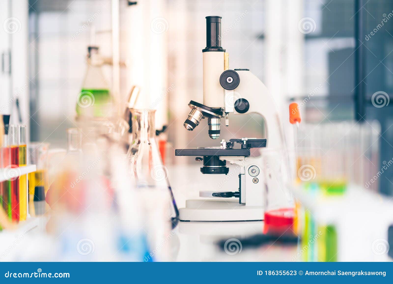 Microscope with Glass Tube on the Table in the Science Room Stock Image ...