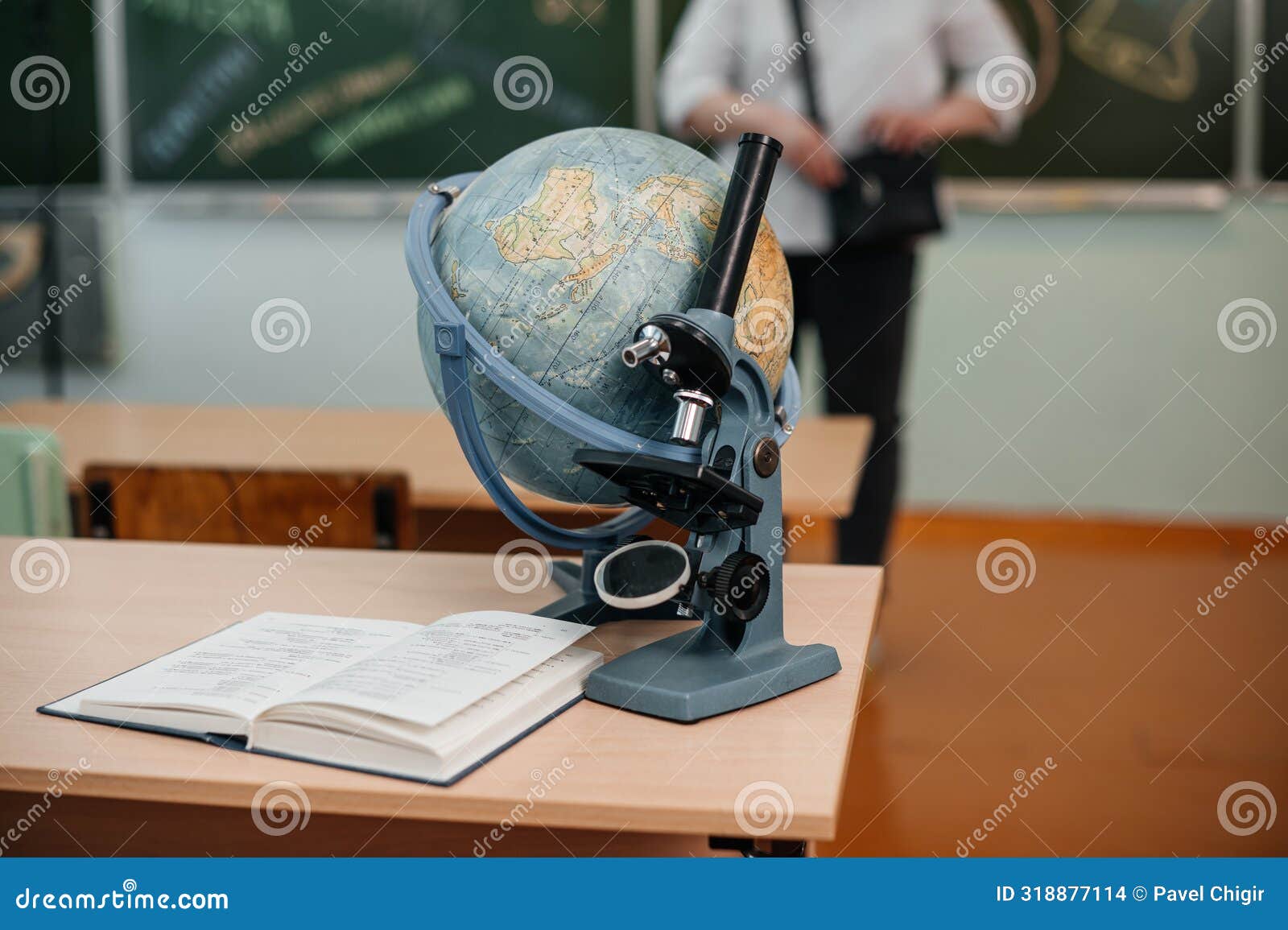 A Microscope with a Globe is on the School Desk Stock Photo - Image of ...
