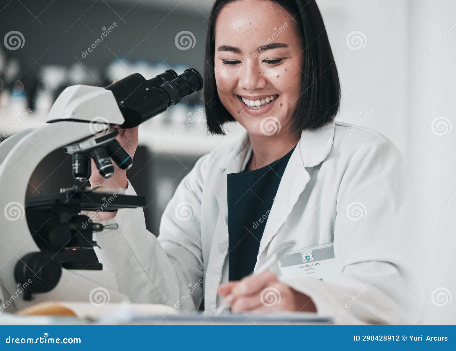 Microscope, Happy Woman and Writing Research in Laboratory for Science ...