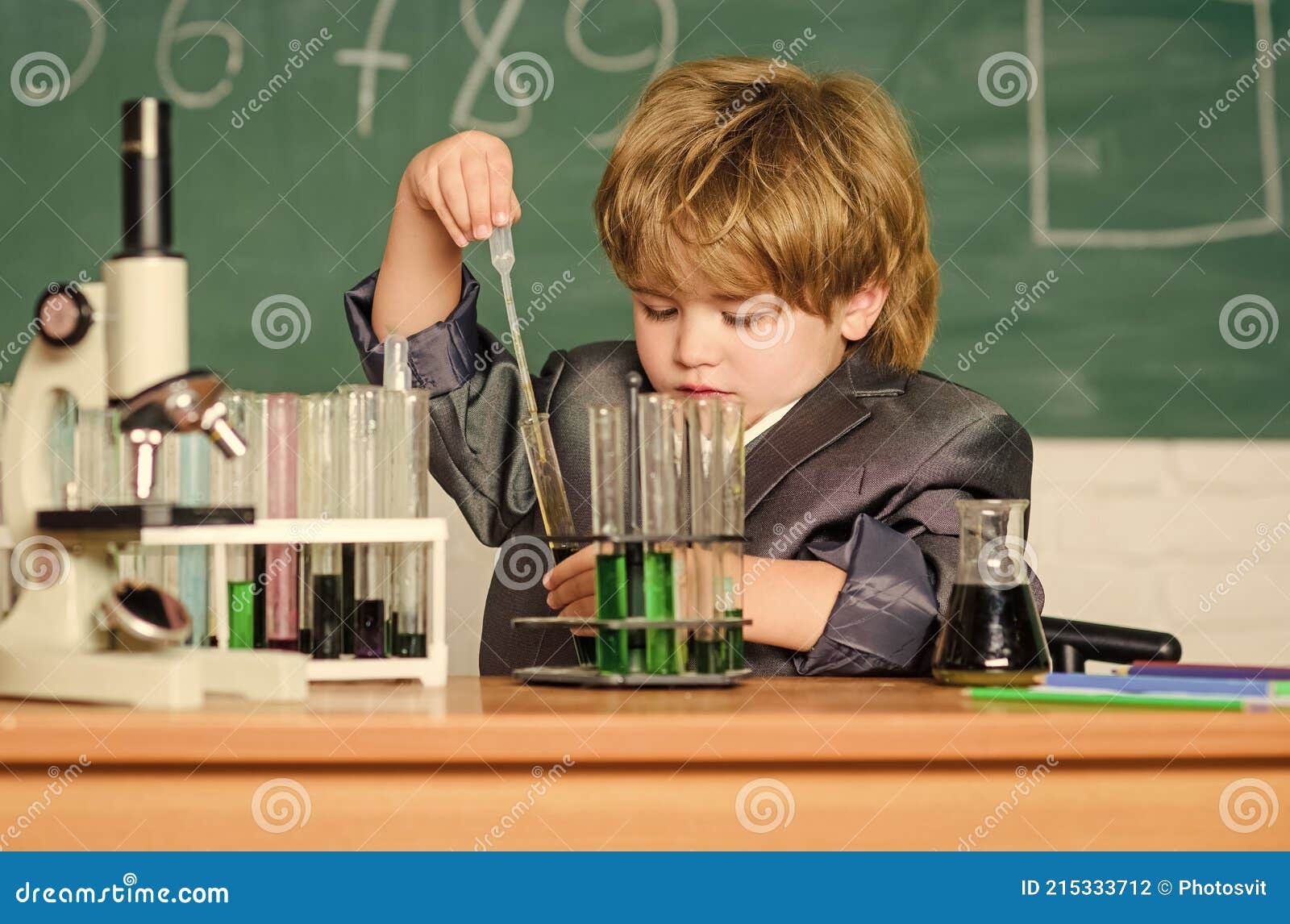 Microscope at Lab. Small Boy Using Microscope at Lesson. Student Do ...