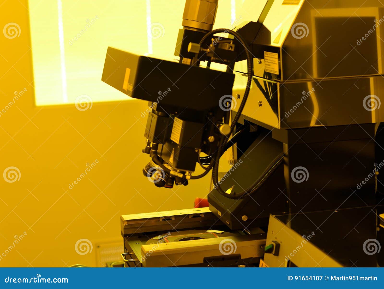 Microscope in Laboratory Under the Yellow Light for Working with Stock ...