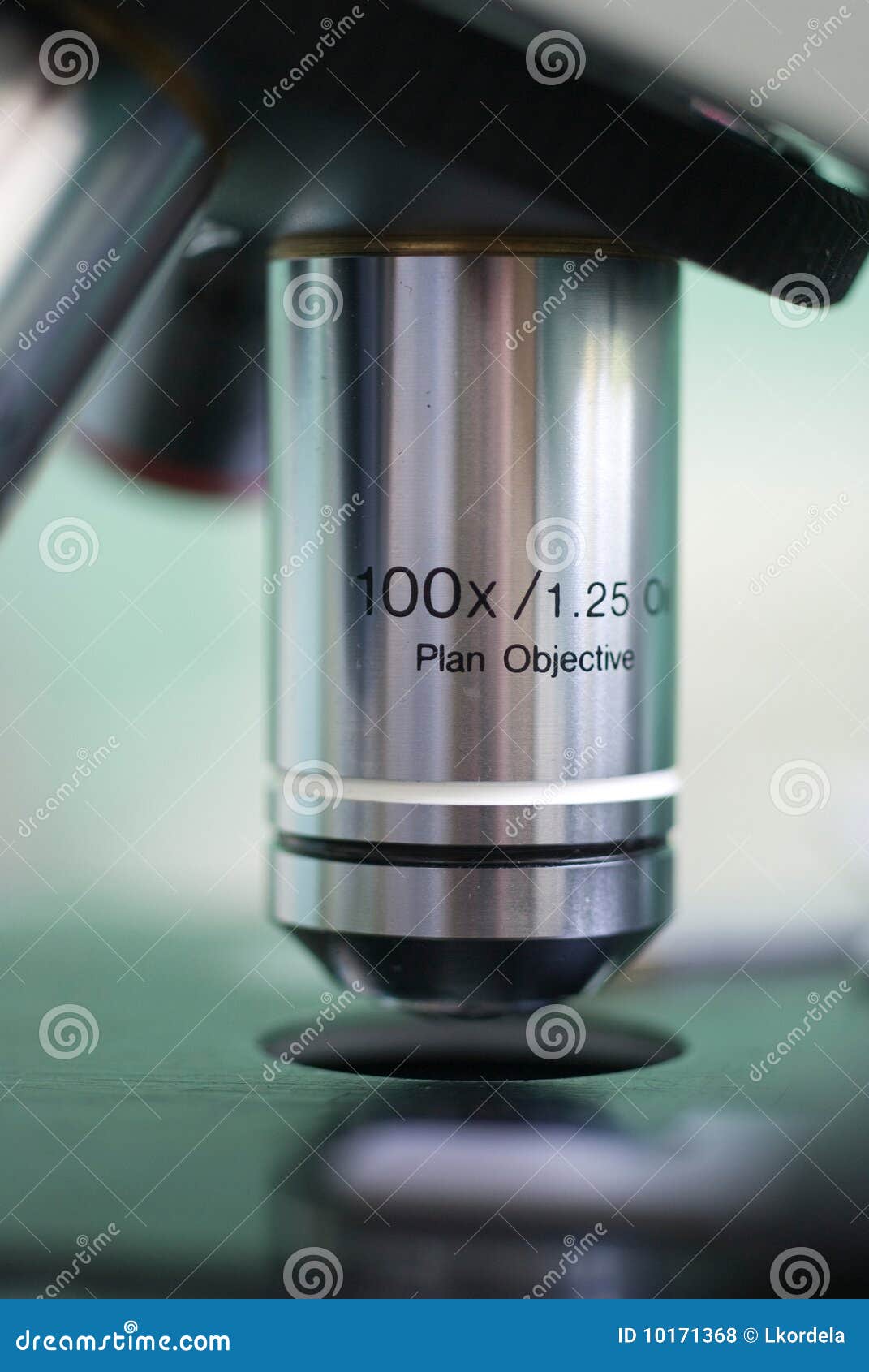 Microscope lens 100x stock photo. Image of discovery - 10171368
