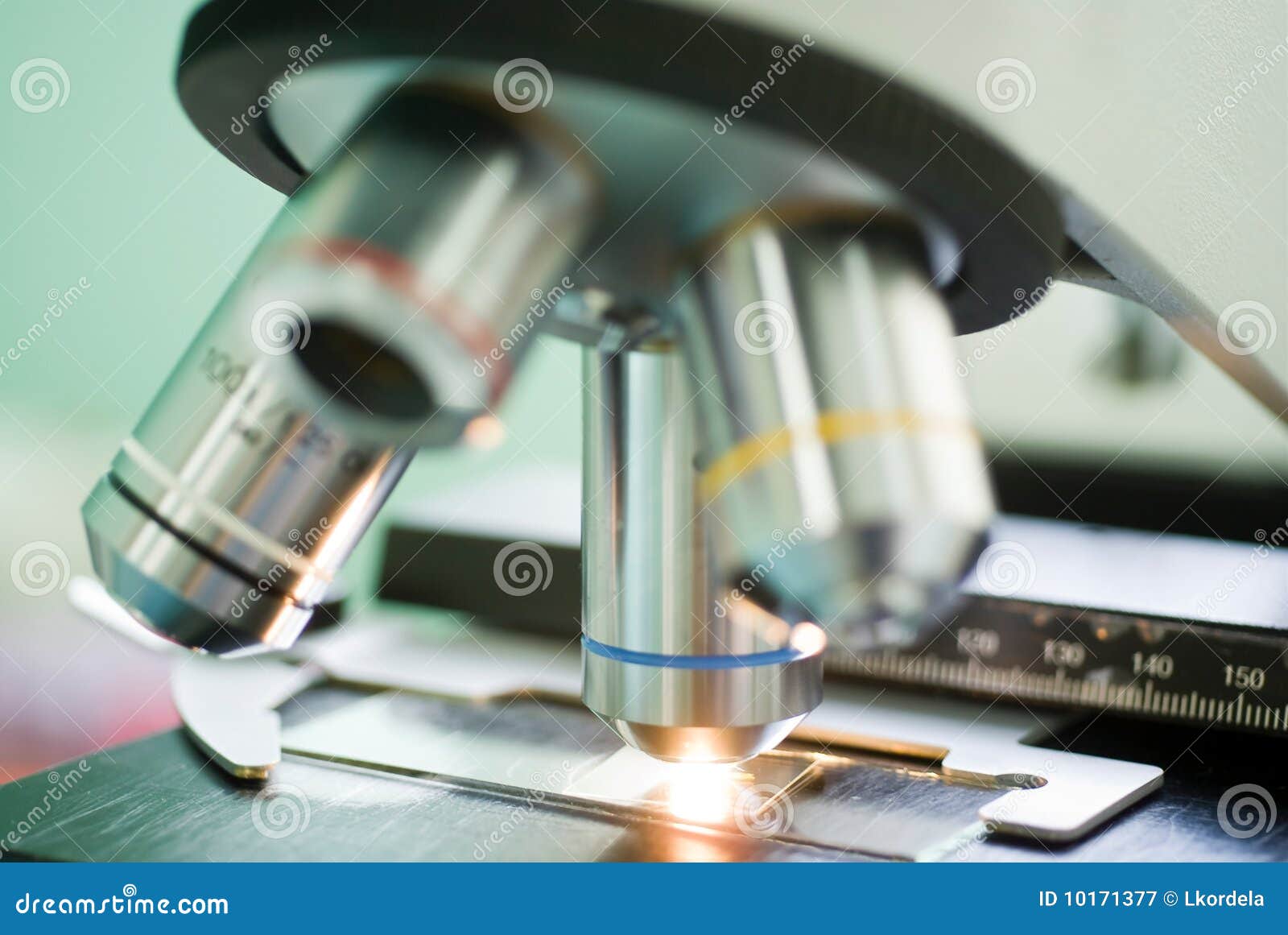 Microscope Lens with Blue Strip on Sample Stock Image - Image of ...