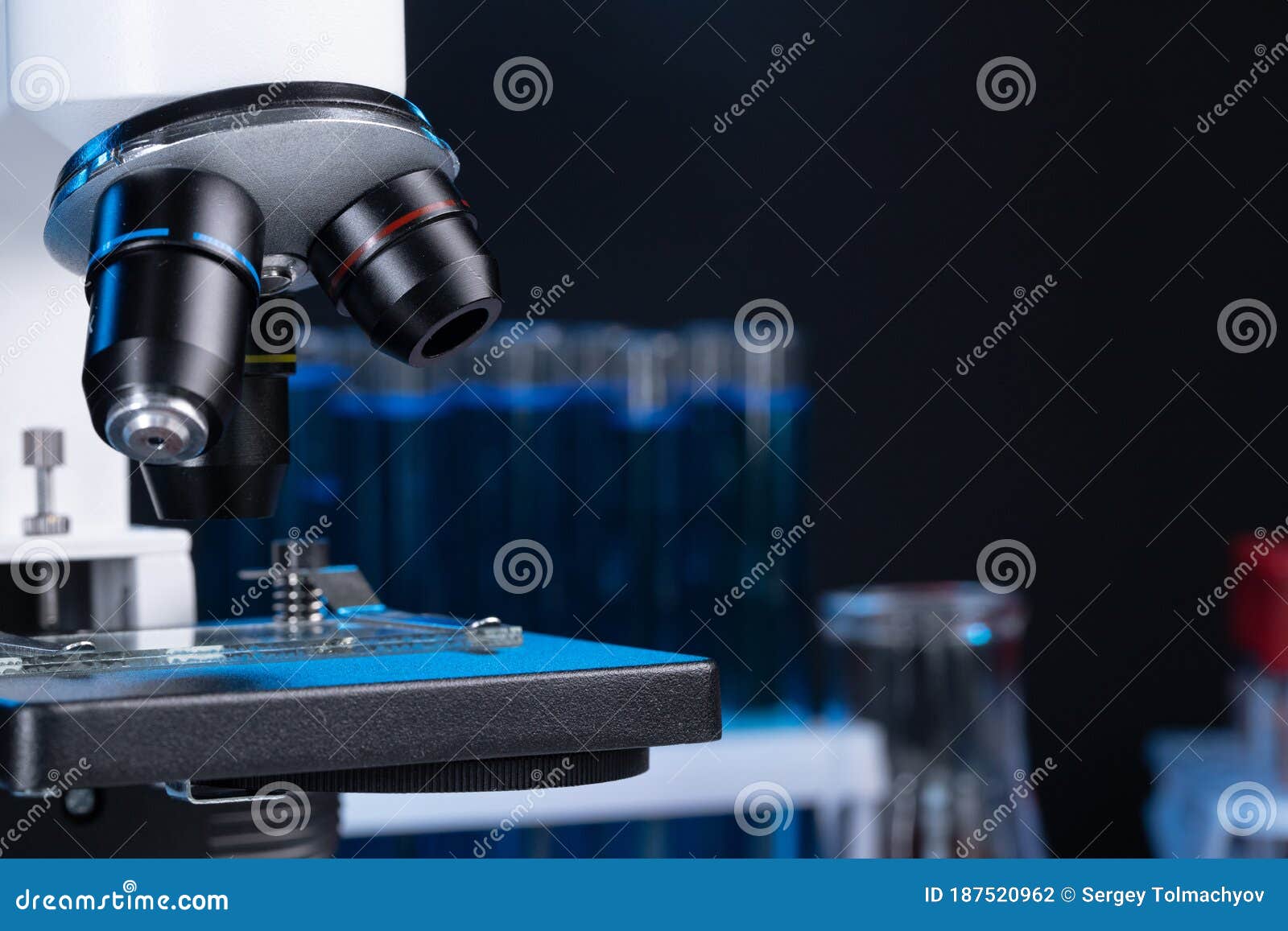 Microscope with Lenses Close Up Against Dark Background Stock Photo ...