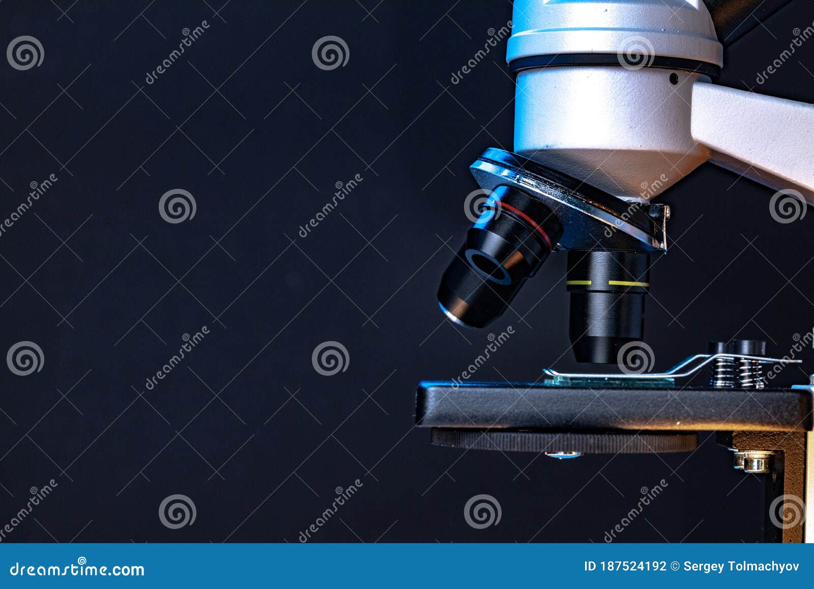 Microscope with Lenses Close Up Against Dark Background Stock Photo ...