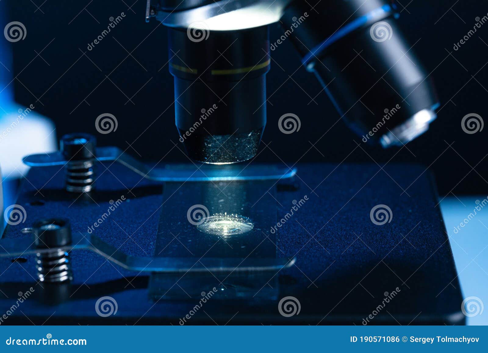 Microscope with Lenses Close Up Against Dark Background Stock Photo ...