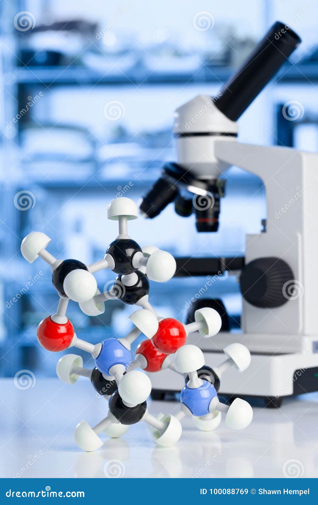 Microscope with Molecule Model in Lab Stock Image - Image of closeup ...