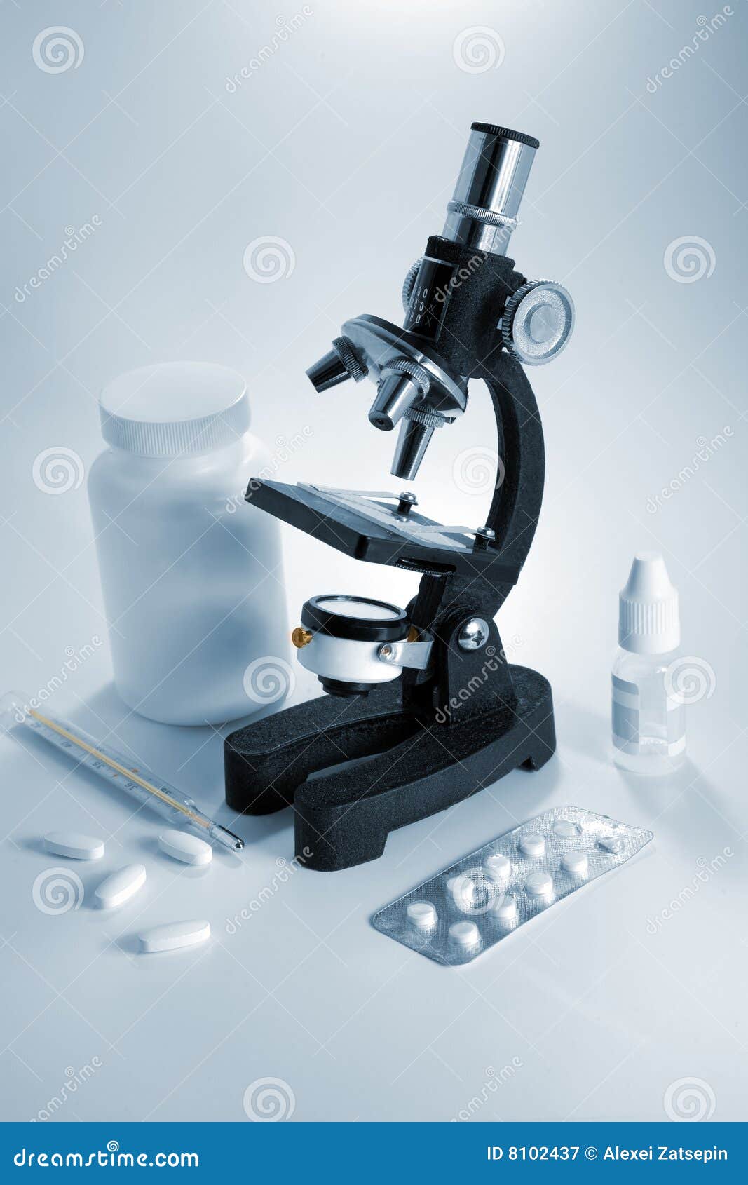 Microscope and pills stock image. Image of pack, healthy - 8102437