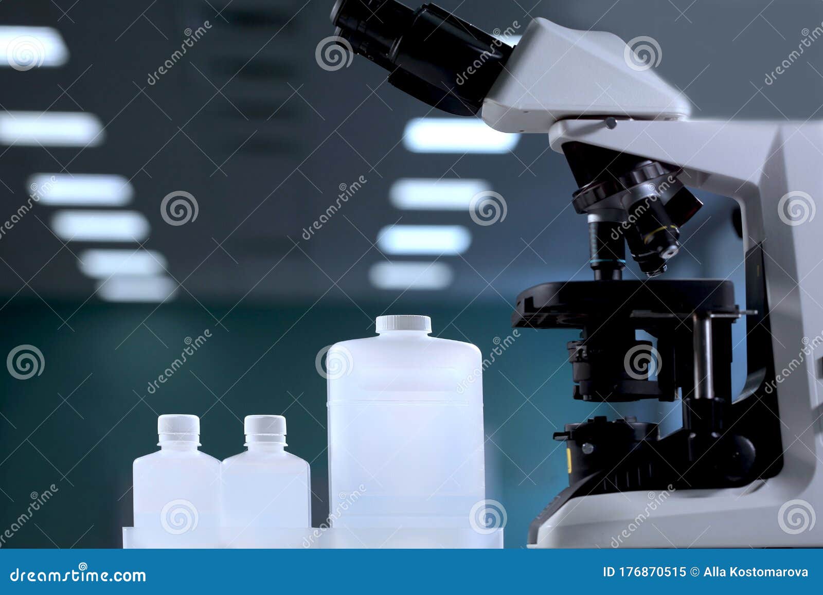 The Microscope and Plastic Bottles are on the Table in the Clinical ...