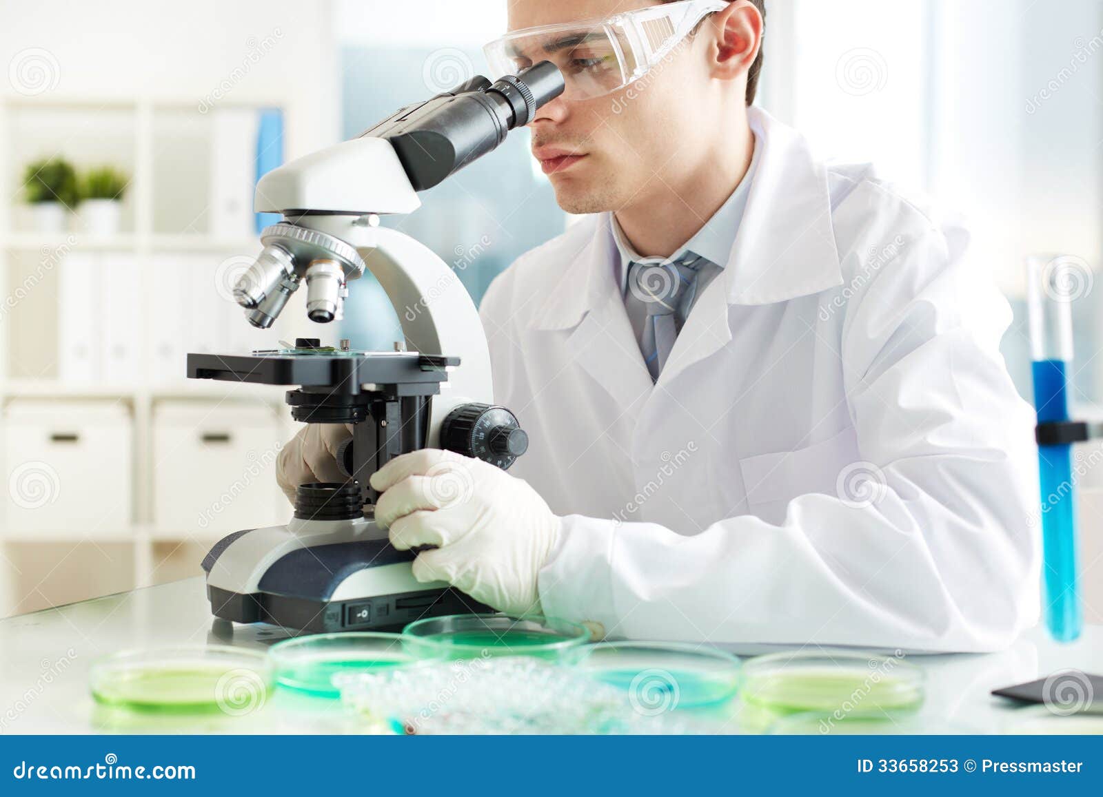 Microscope research stock image. Image of analyzing, male - 33658253