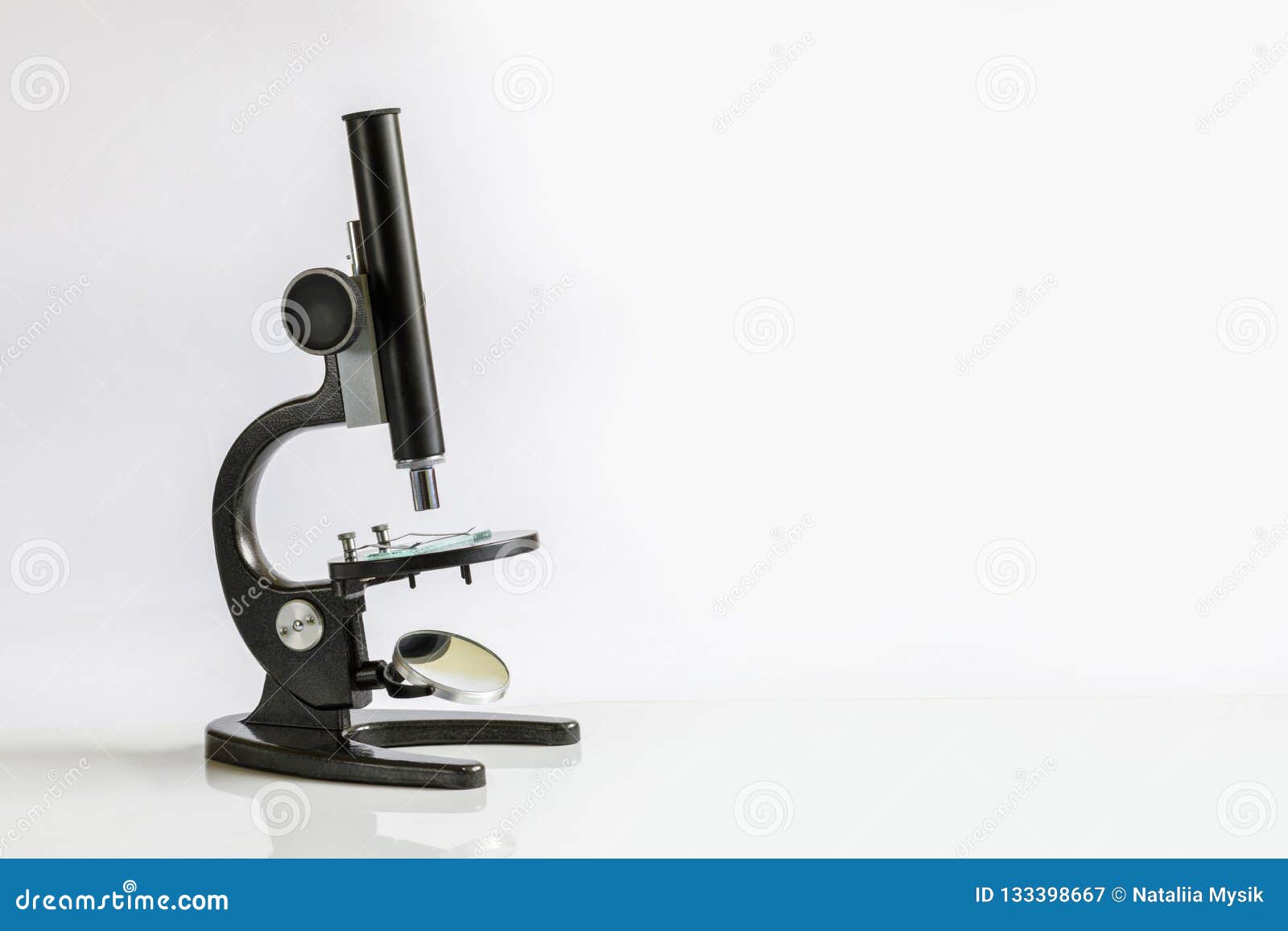 A Microscope with Some Substance on Its Working Surface is Standing on ...