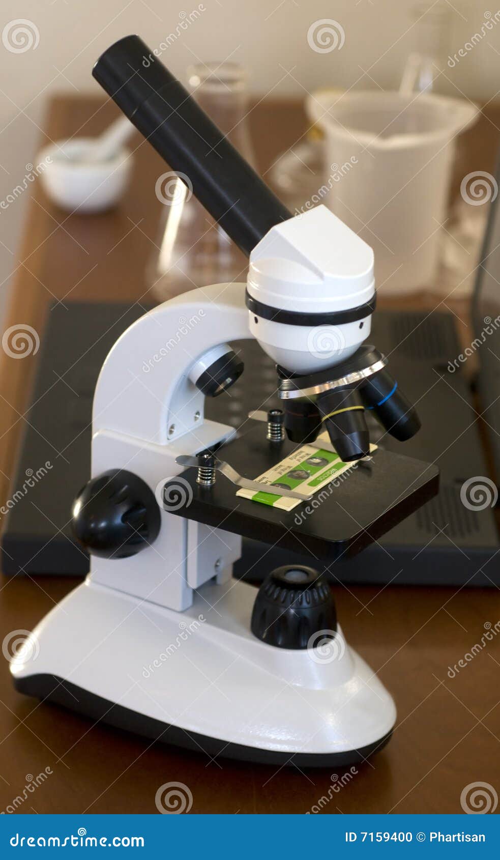 Microscope on table stock photo. Image of research, slide - 7159400