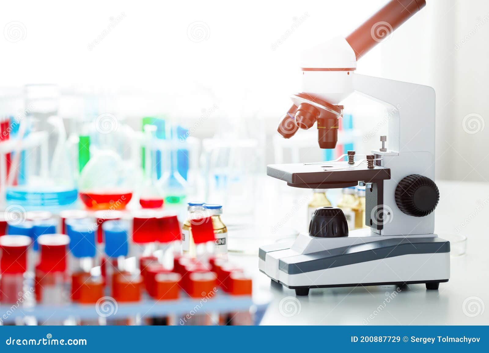 Microscope on the Table with Glassware in Laboratory Stock Image ...