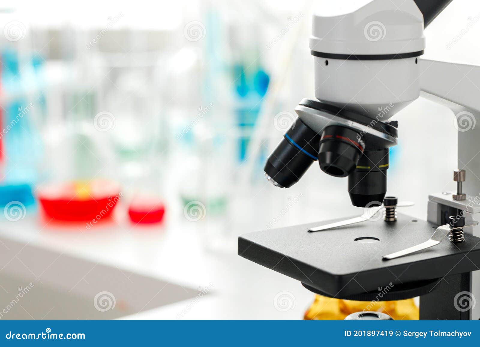 Microscope on the Table with Glassware in Laboratory Stock Image ...
