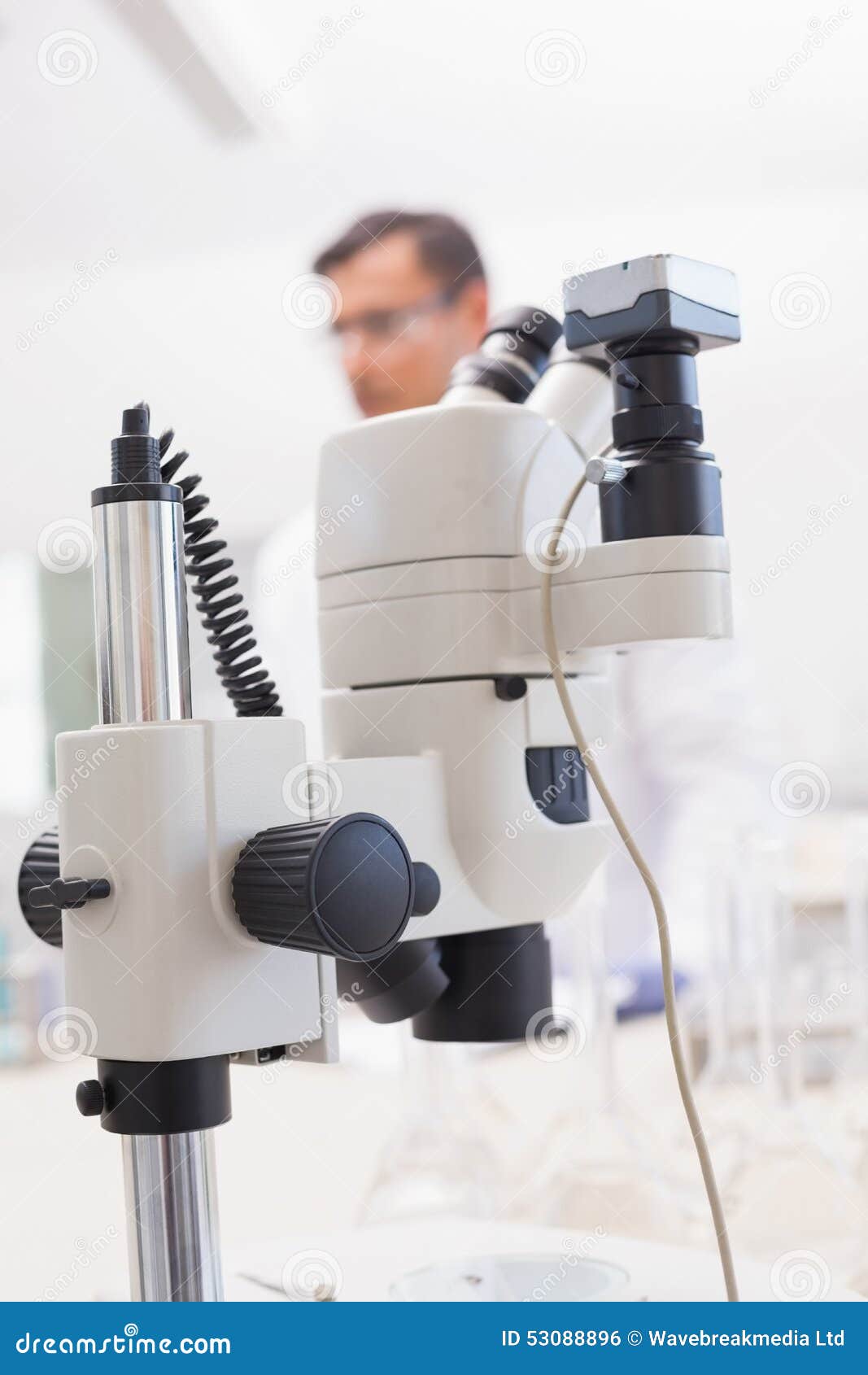 Microscope on Table Near Scientist Stock Photo - Image of biochemistry ...