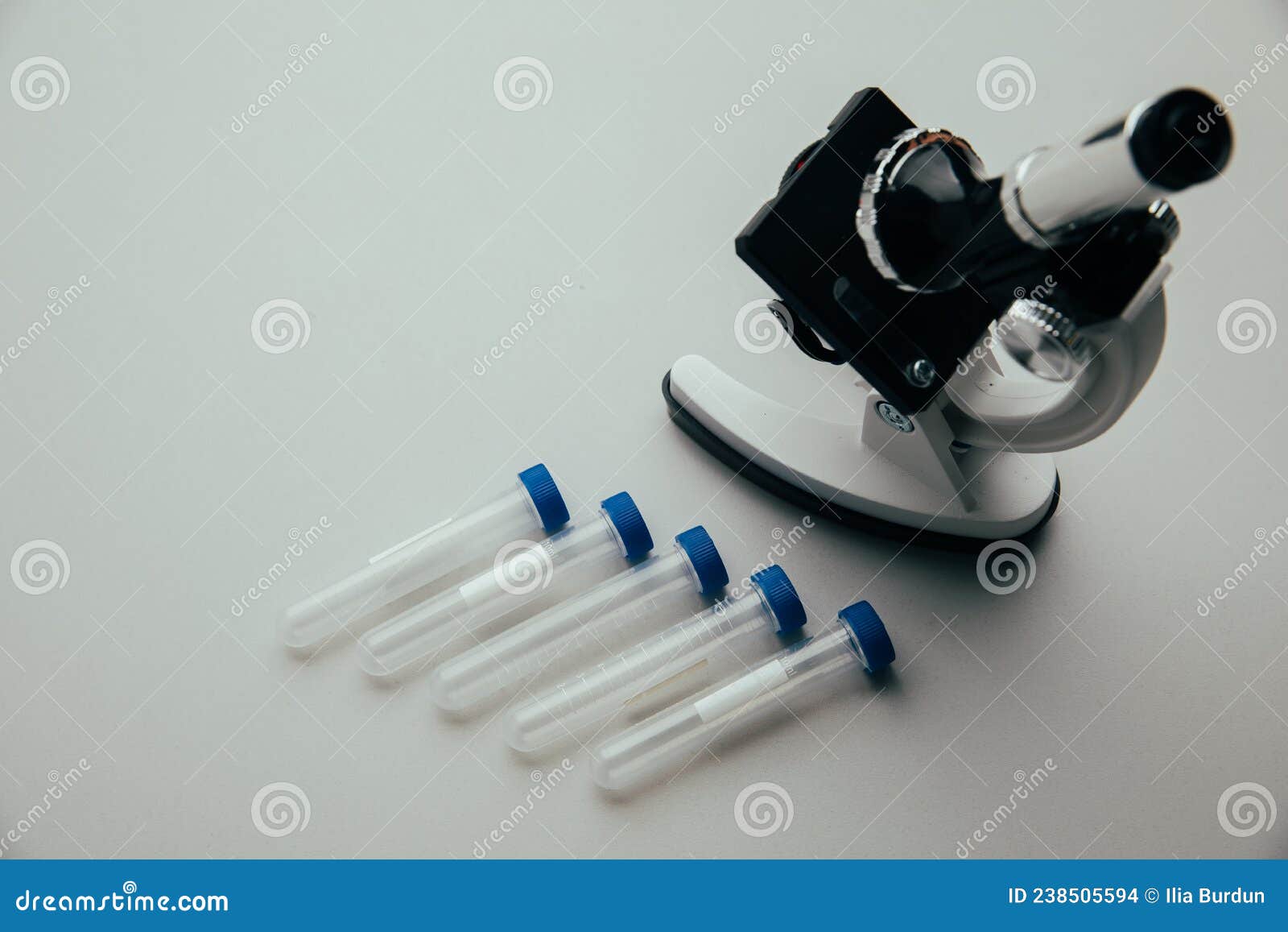 Microscope and Test Tube on a Table. Healthcare Concept Stock Photo ...