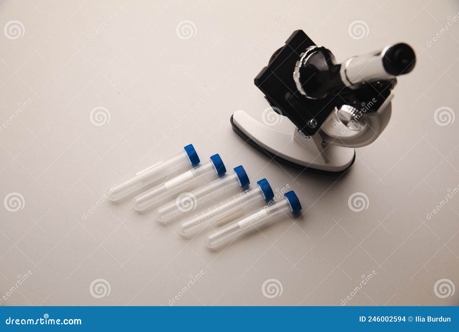 Microscope and Test Tube on a Table. Healthcare Concept Stock Photo ...