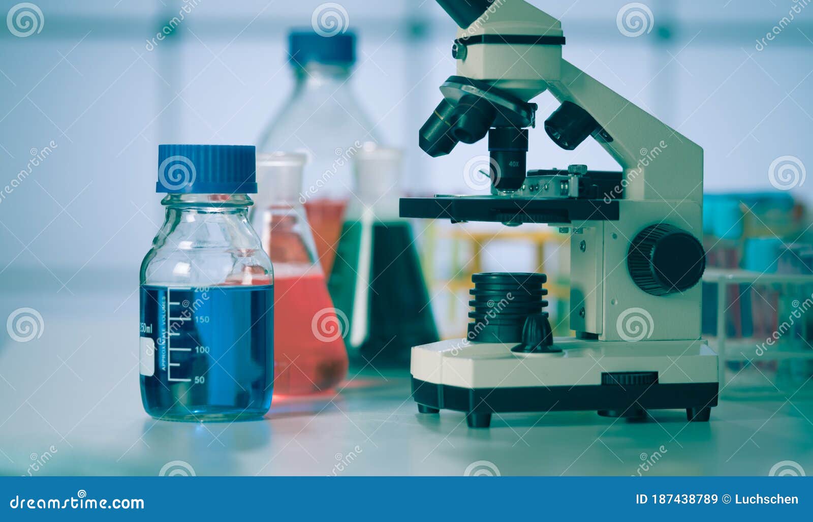 Microscope and Test Tubes on Laboratoy Table Stock Image - Image of ...