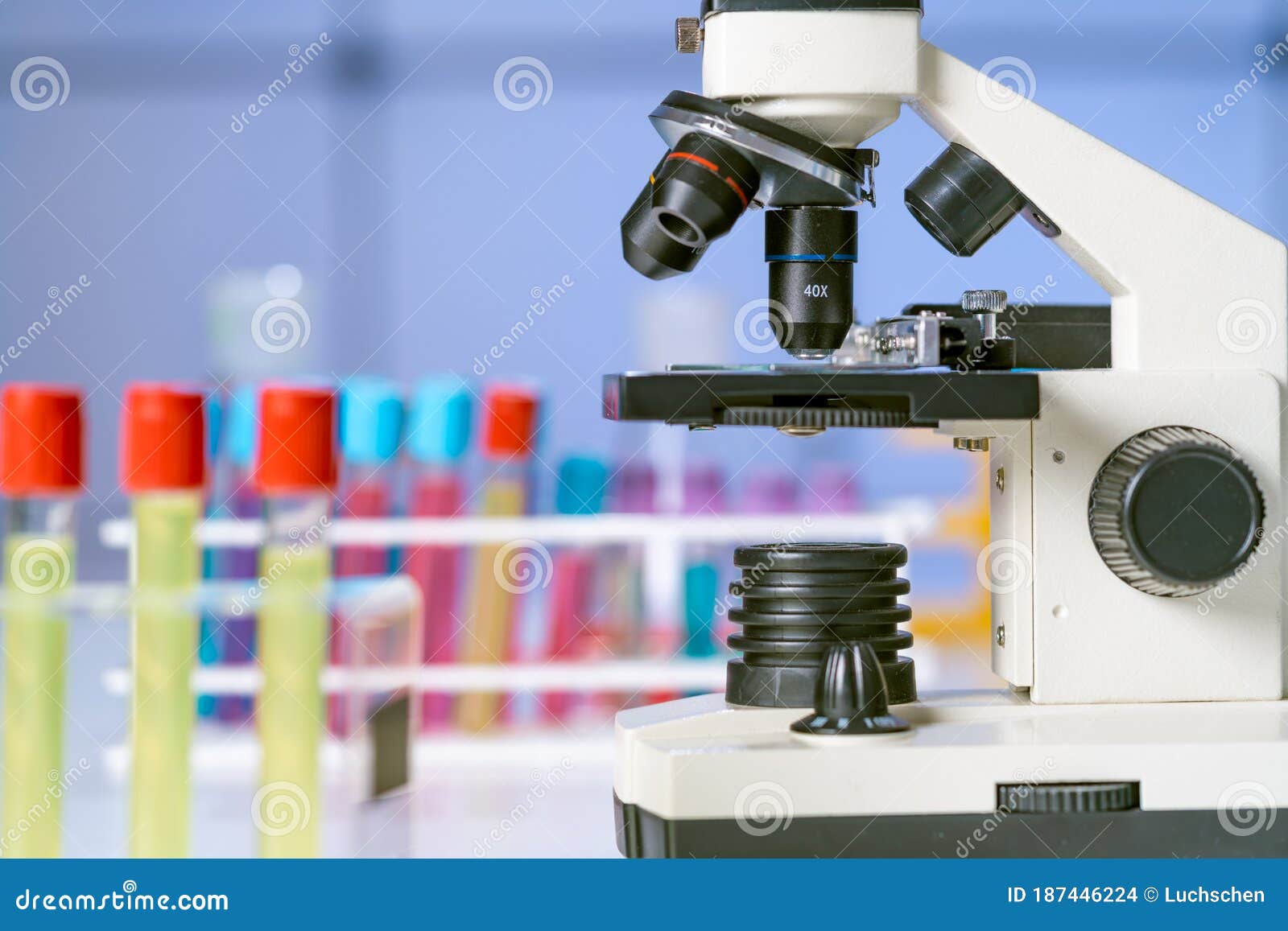 Microscope and Test Tubes on Laboratoy Table Editorial Stock Image ...
