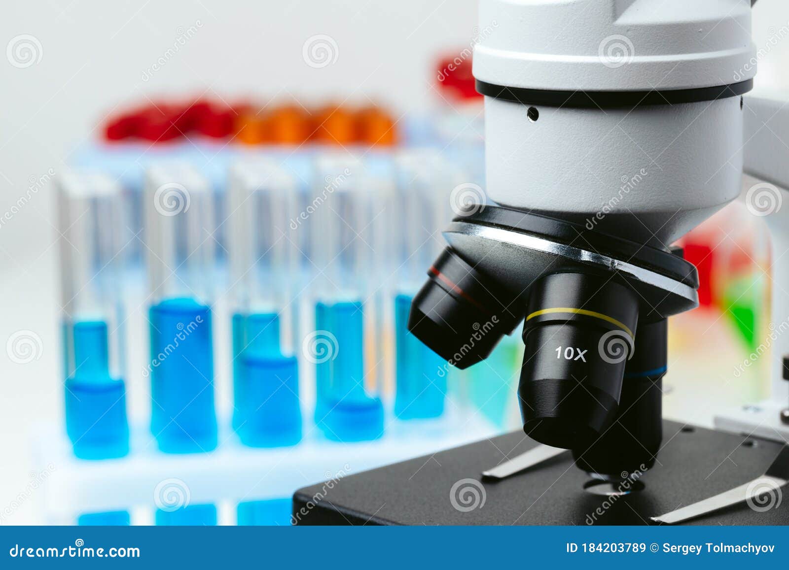 Microscope and Test Tubes on Table in Laboratory, Close Up Stock Image ...