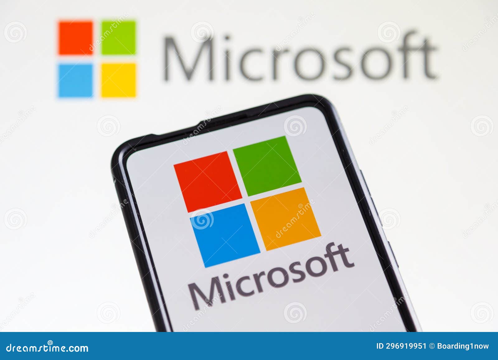 Microsoft Logo of the Software Company on a Mobile Phone and Computer ...