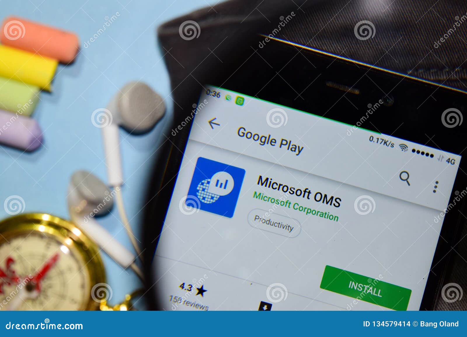 Microsoft OMS Dev App with Magnifying on Smartphone Screen Editorial ...